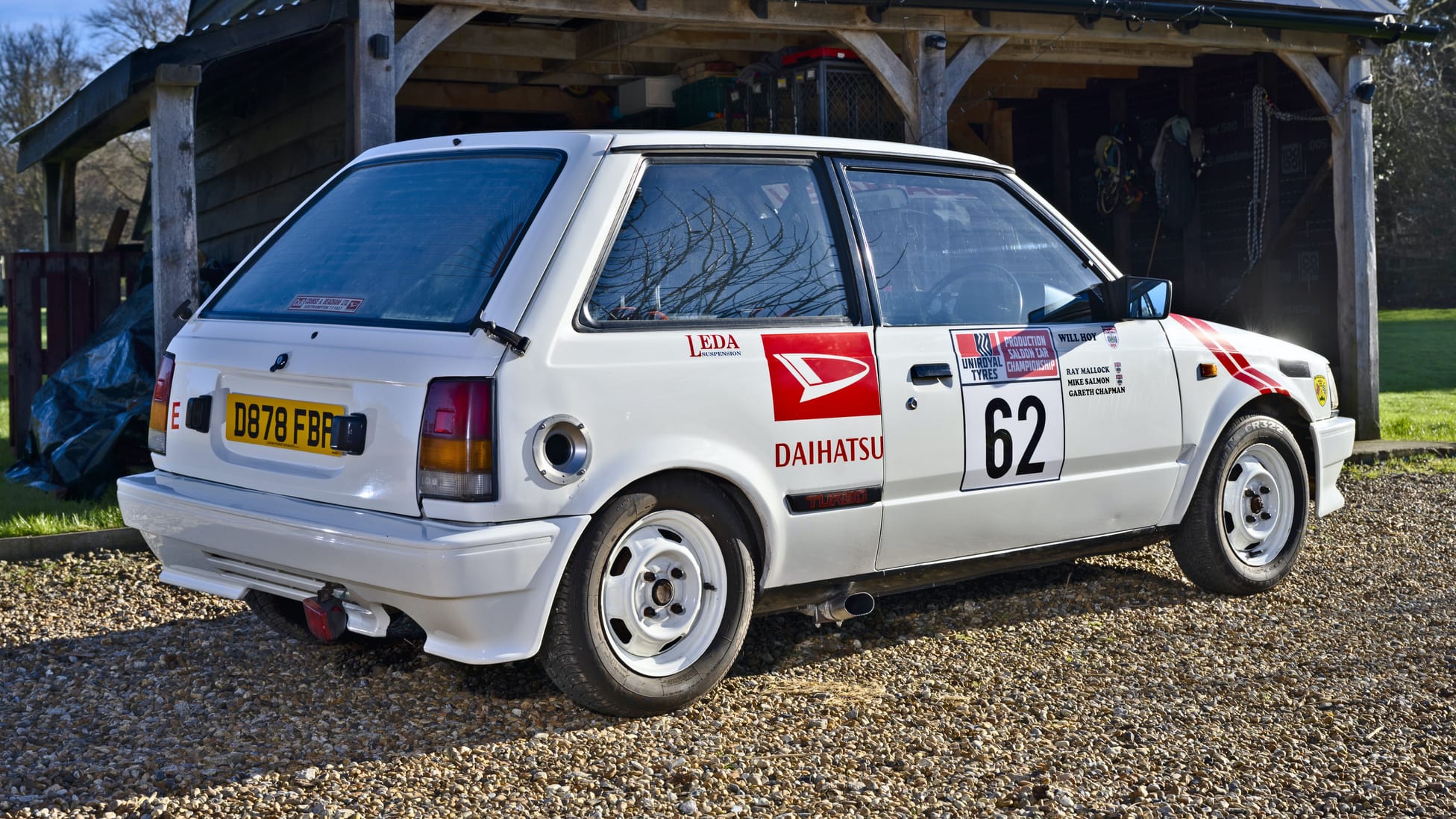 Check out this Daihatsu Charade Turbo racer with a side-exit exhaust ...