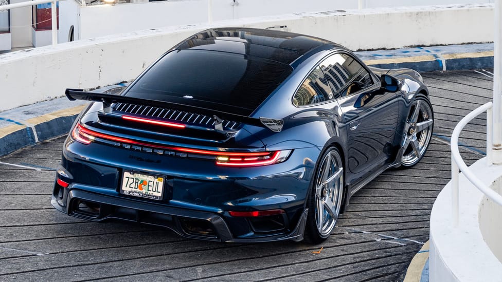 This is a $200k modified Porsche 911 Turbo S with carbon fibre aero ...