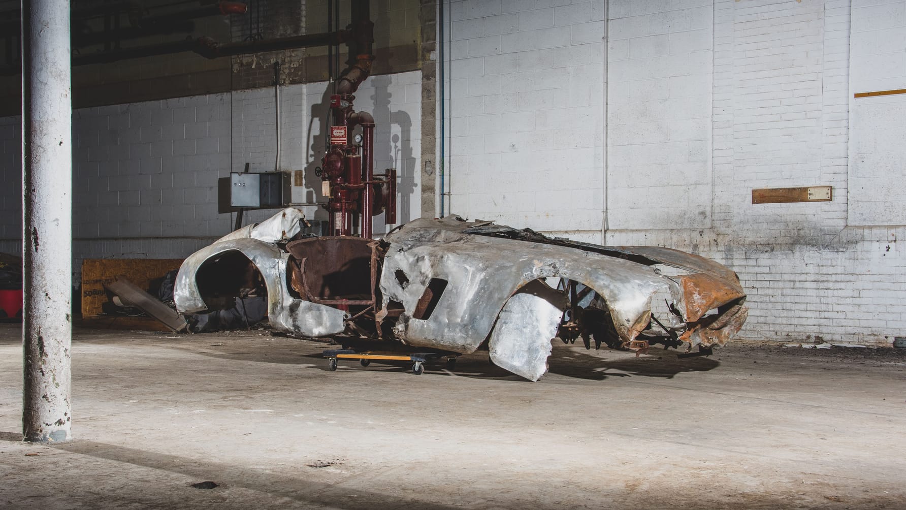 Sold! Burnt-out Ferrari fetches $1.9m at Monterey auction | Top Gear