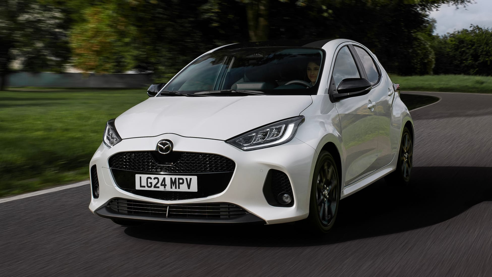 Mazda is now trying a little harder to convince us the 2 Hybrid isn’t a ...