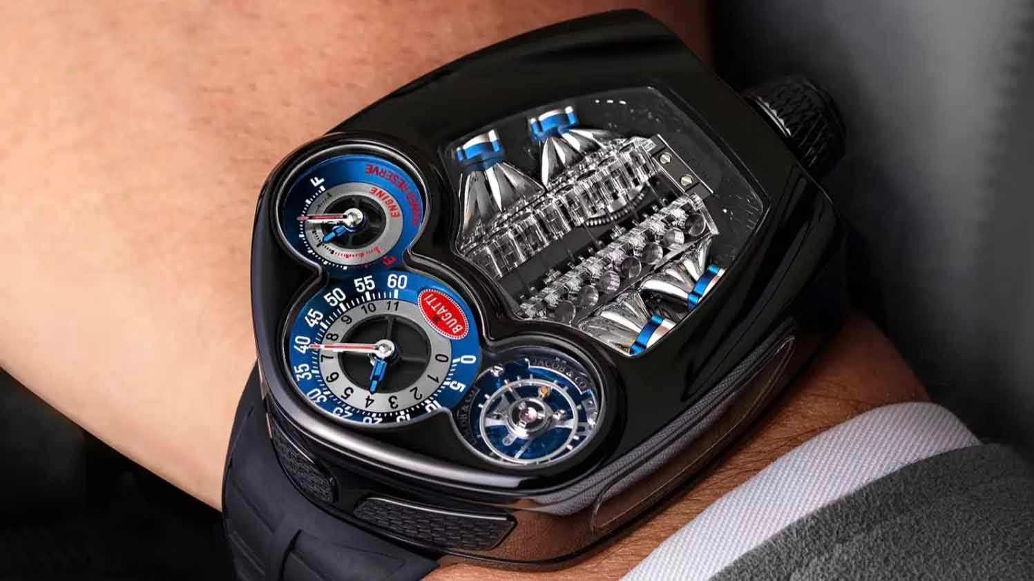 This is a Bugatti Tourbillon-inspired watch with a teeny V16 engine ...