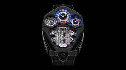 This is a Bugatti Tourbillon-inspired watch with a teeny V16 engine ...