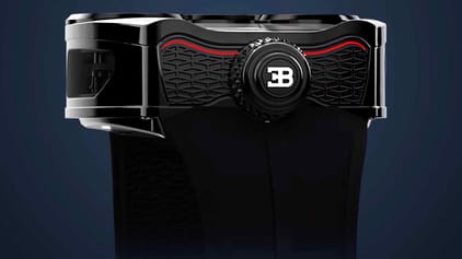 This is a Bugatti Tourbillon-inspired watch with a teeny V16 engine ...