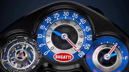 This is a Bugatti Tourbillon-inspired watch with a teeny V16 engine ...
