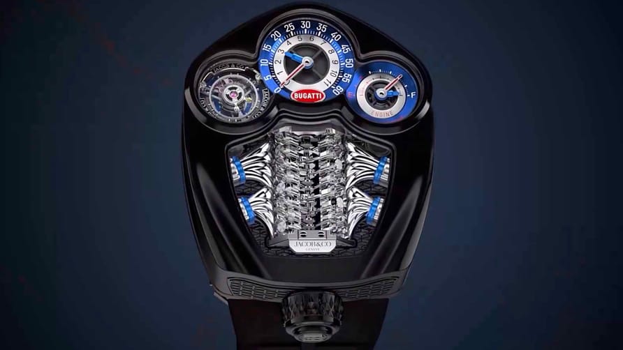 This is a Bugatti Tourbillon-inspired watch with a teeny V16 engine ...