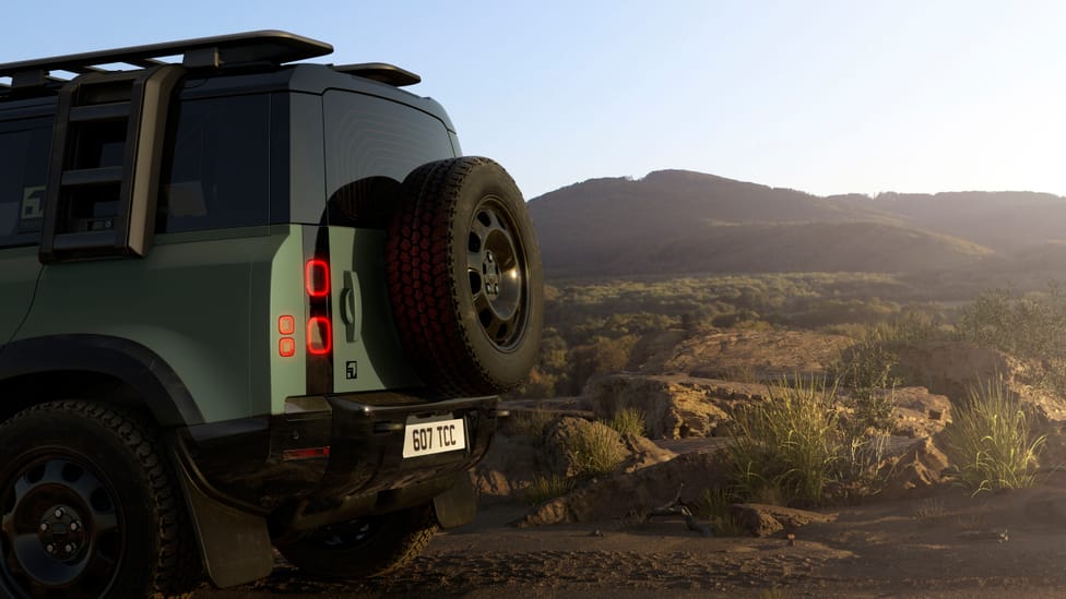 The new Defender 110 Trophy Edition can scale mountains in yellow or ...