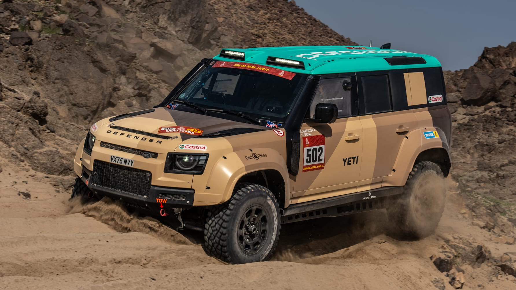 Rokas Baciuška makes Dakar history for Defender | Top Gear