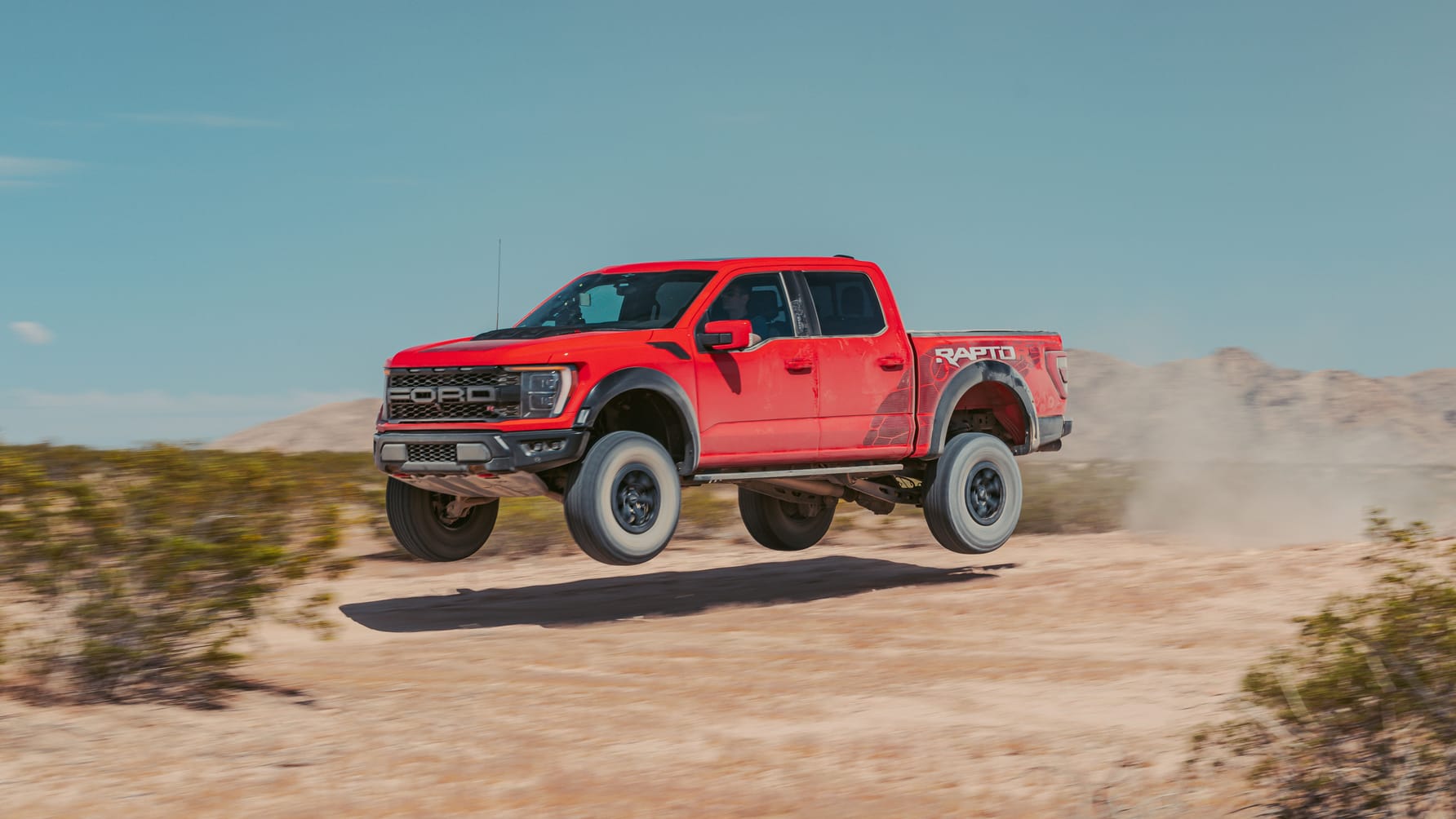 The Rap Pack: long jumps in a Ford F-150 Raptor and Bronco Raptor | Top ...