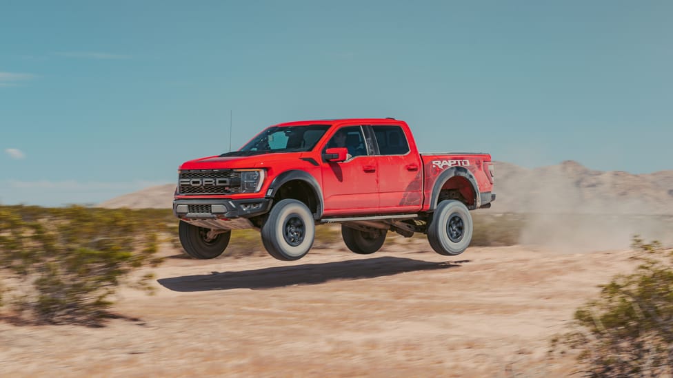 The Rap Pack: long jumps in a Ford F-150 Raptor and Bronco Raptor | Top ...