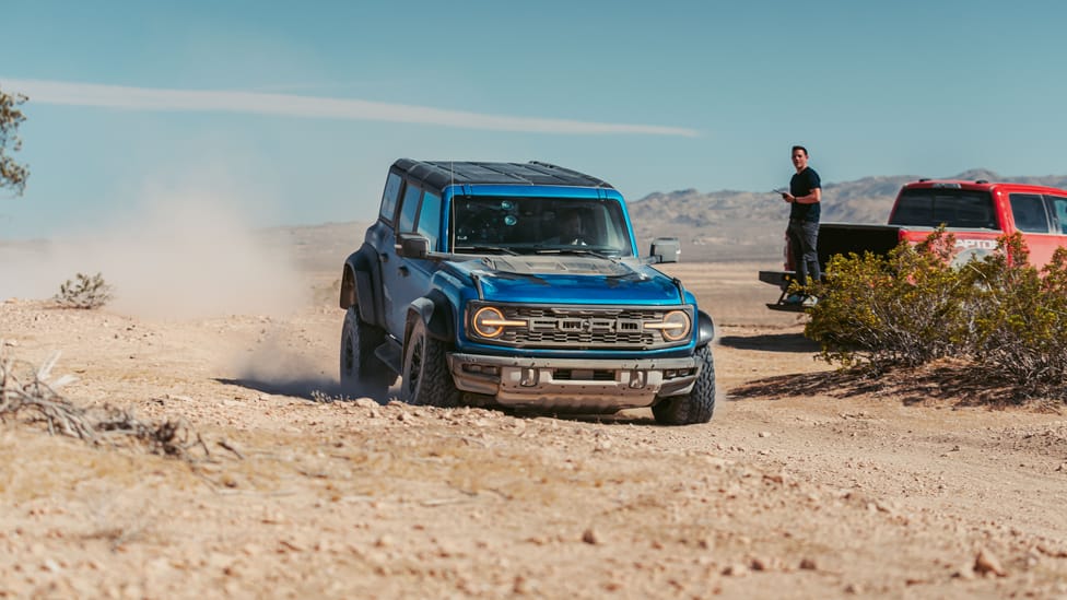The Rap Pack: long jumps in a Ford F-150 Raptor and Bronco Raptor | Top ...