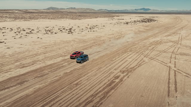The Rap Pack: long jumps in a Ford F-150 Raptor and Bronco Raptor | Top ...