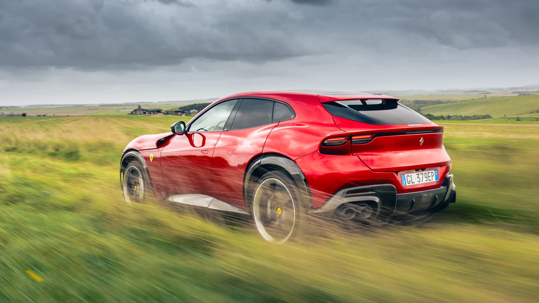 What exactly *is* the Ferrari Purosangue, and what's it like against ...