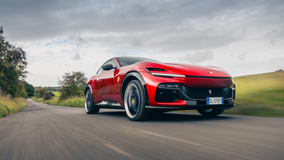 What exactly *is* the Ferrari Purosangue, and what's it like against ...