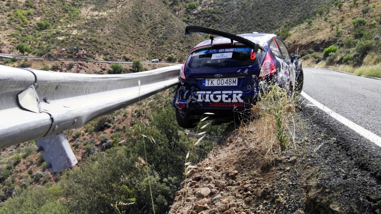 Watch a crash barrier save a rally car from disaster | Top Gear