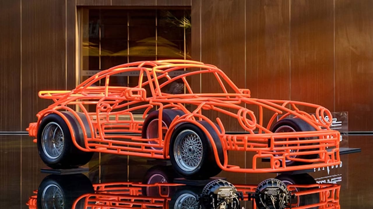 This funky lifesize sculpture of a Porsche 934 just sold for over £200k ...