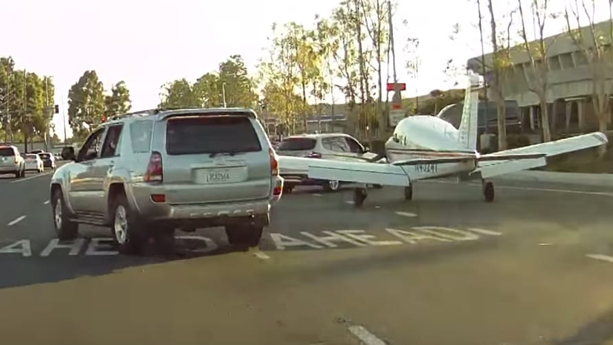 Watch: dash-cam footage of a plane going through a set of traffic ...
