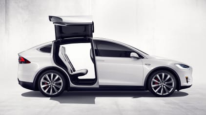The Tesla Model X is a 762bhp, 7-seat, electric gullwing SUV | Top Gear