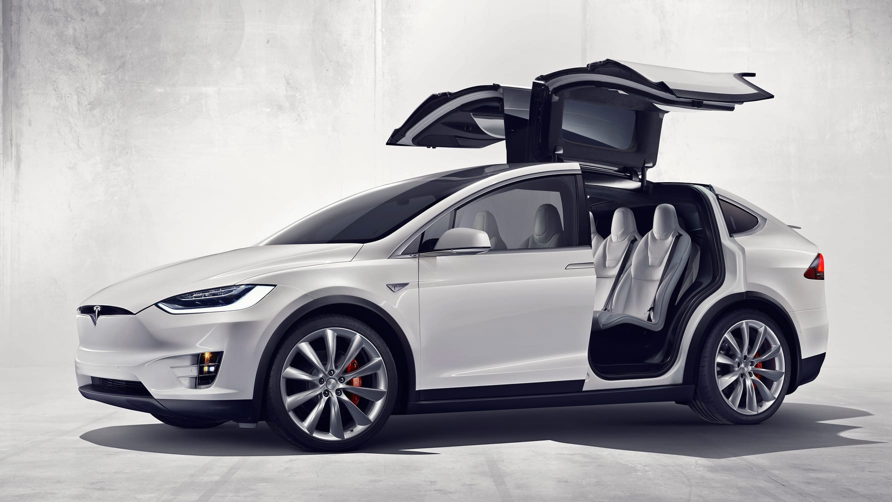 The Tesla Model X is a 762bhp, 7-seat, electric gullwing SUV | Top Gear