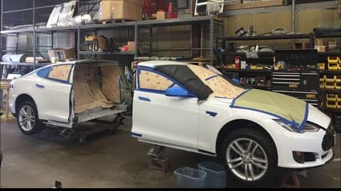 Video: watch someone cut a Tesla in half | Top Gear