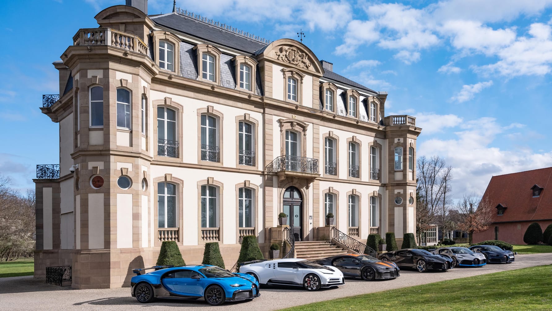 Gaze in wonder at the Bugatti range outside a mansion | Top Gear