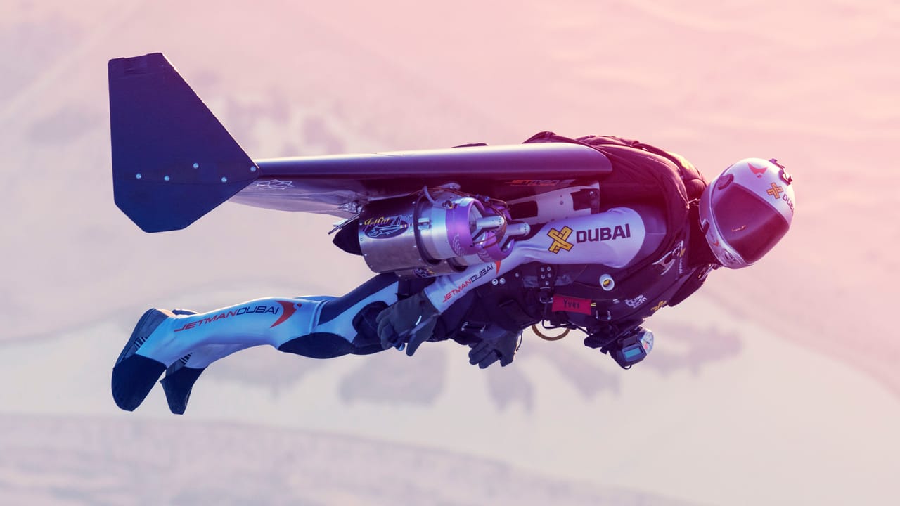 Jetman vs Jaguar's 542bhp XJR | Top Gear